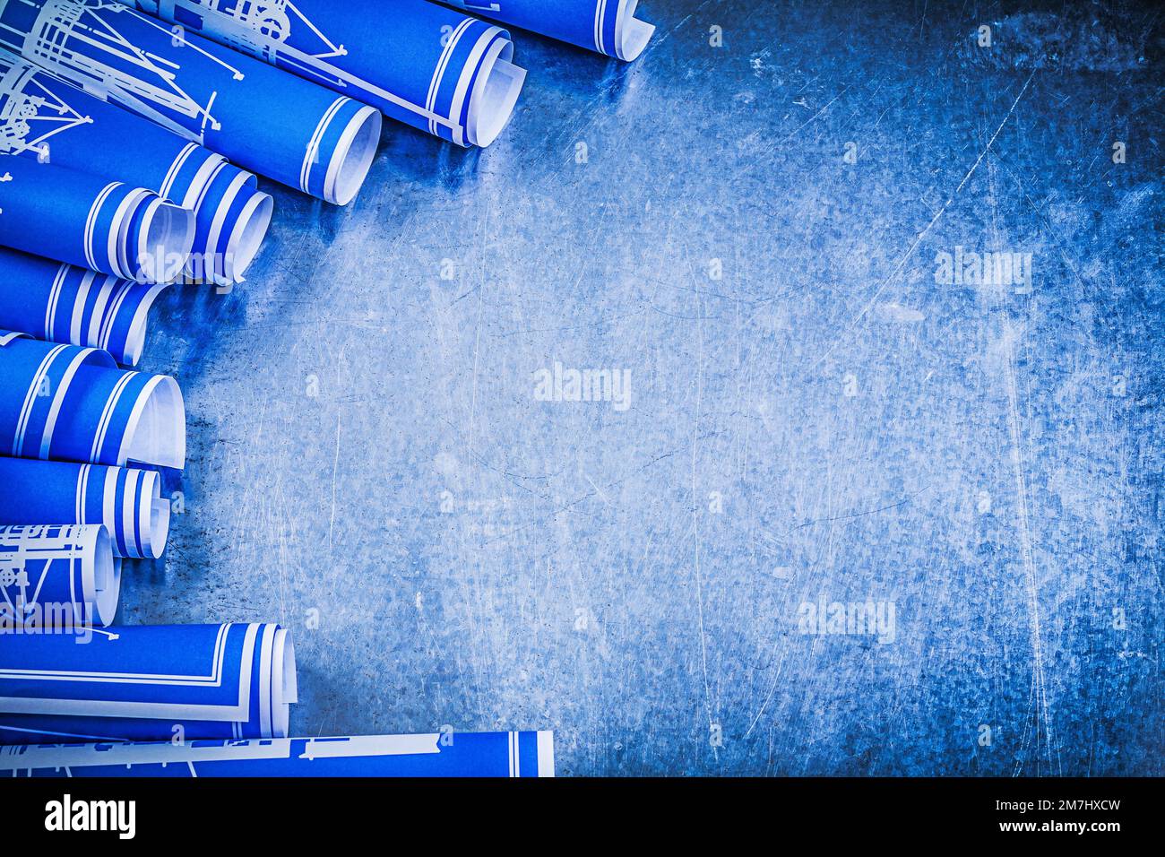 Collection of blue construction plans on metallic background ...