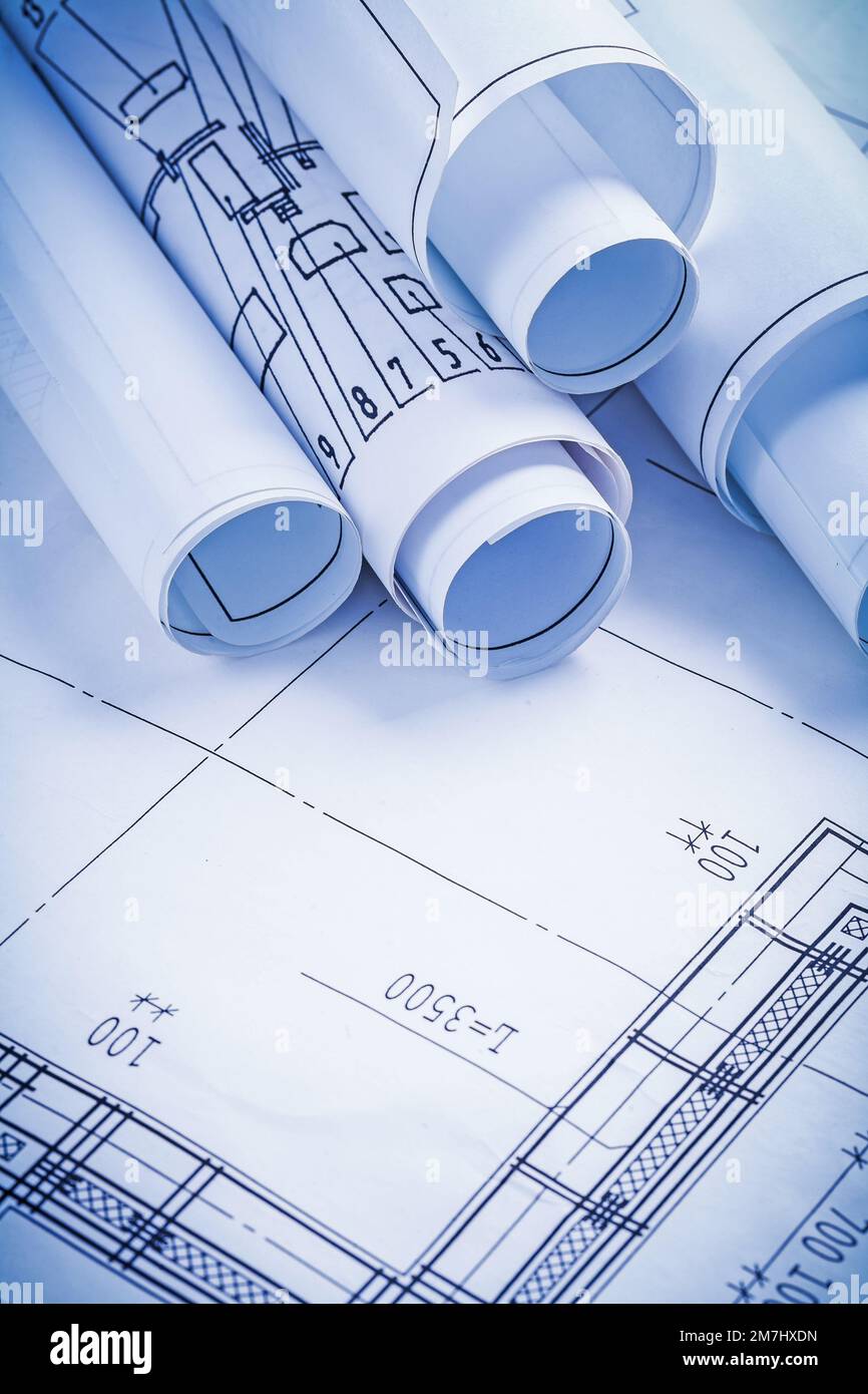 close up view stack of white construction blueprints Stock Photo - Alamy