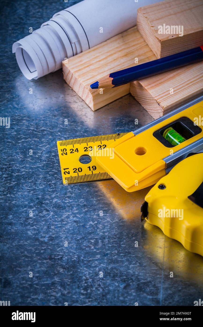 Collection of construction working tools on metallic scratched ...