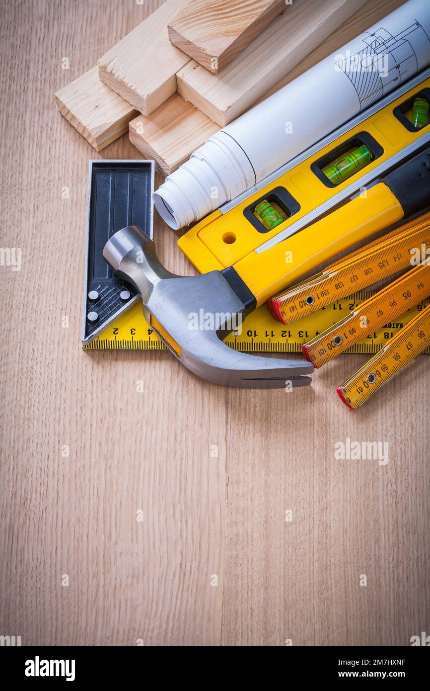 Composition of construction working tools on wooden board building and ...