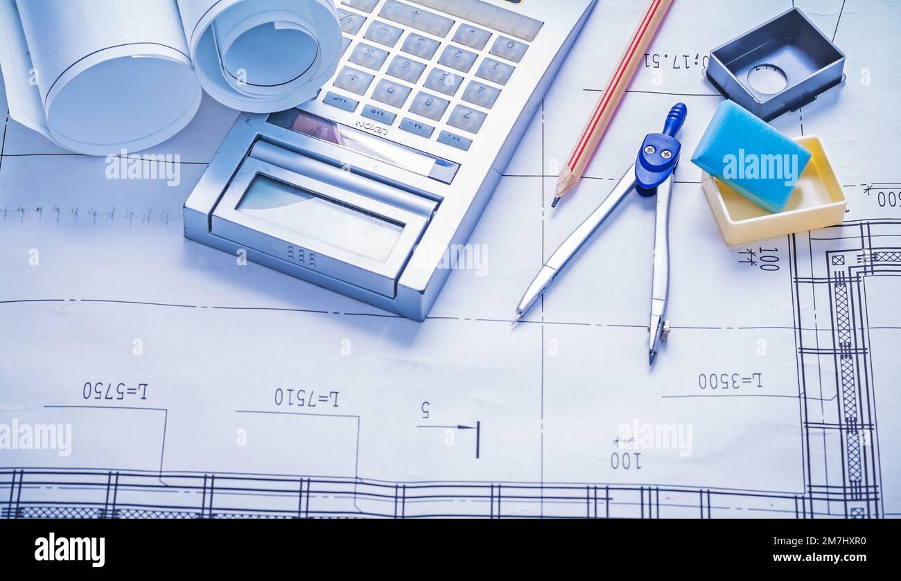 composition rolled blueprints calculator pencil compass eraser Stock ...