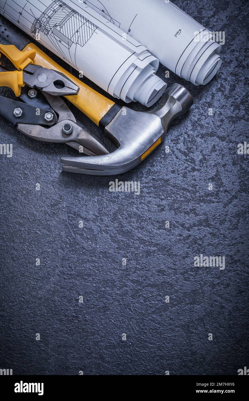 Construction drawings tin snips pliers claw hammer on black background ...