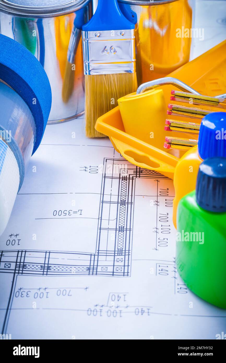 Construction plan with articles for painting duct tape and wooden meter ...