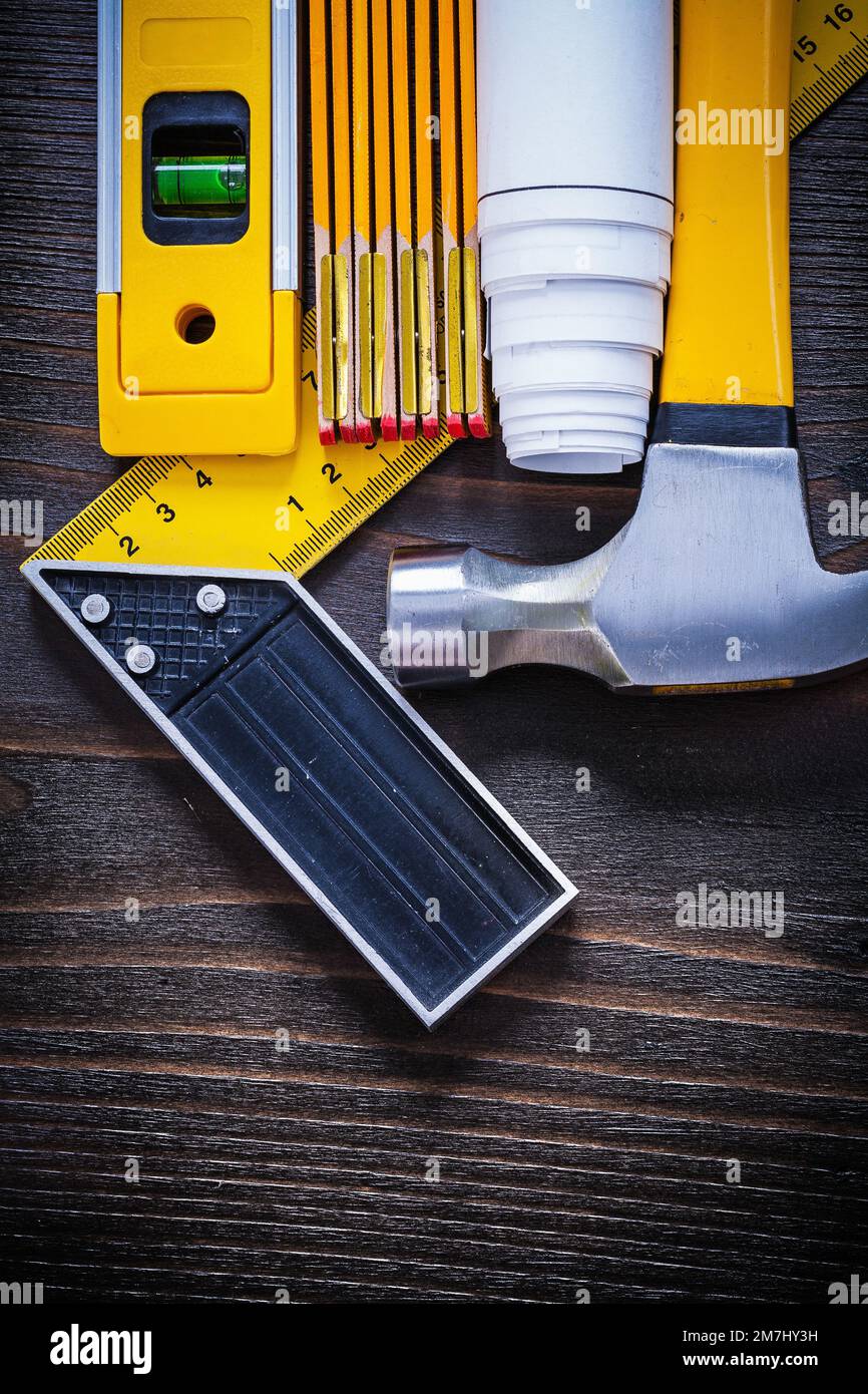 Construction level square ruler blueprint roll wooden meter and claw ...