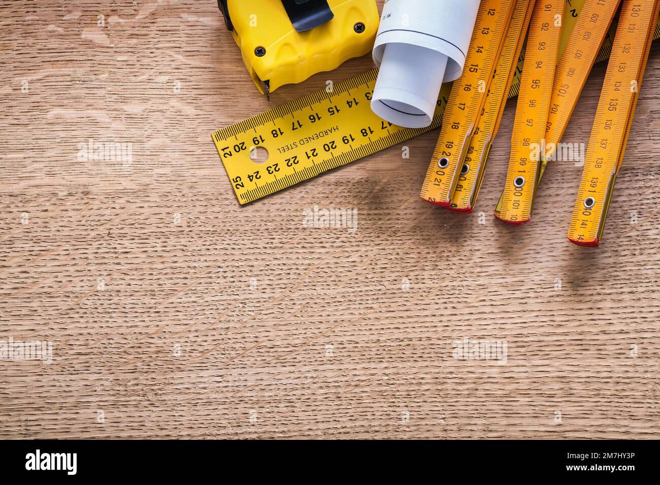 Construction plans and instruments of measurement on oaken wooden board ...
