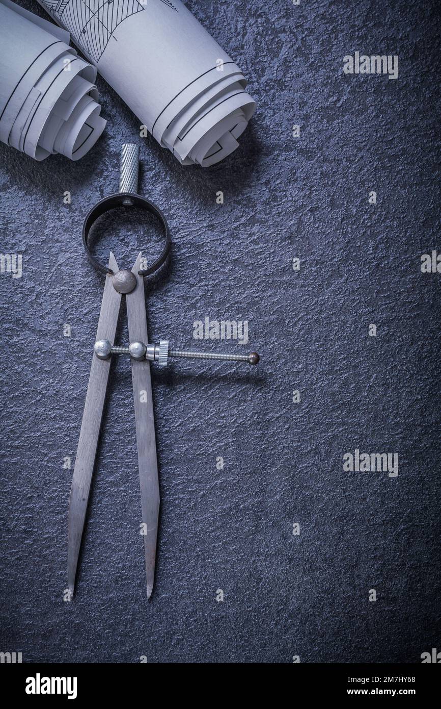 Construction plans drawing compass on black background maintenance ...