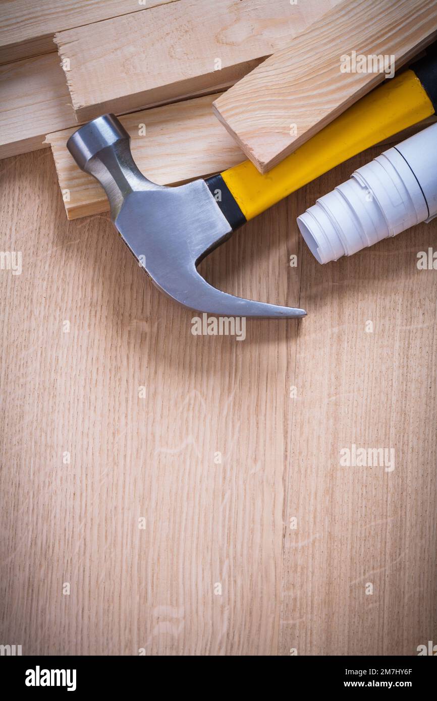 Copy space image of wooden planks claw hammer construction plans on ...