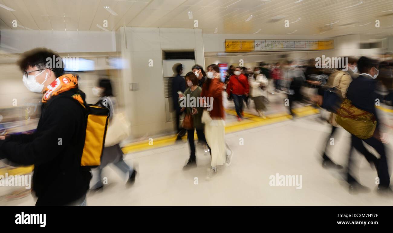 Japanese people rushing through Shinjuku station. Tokyo, Japan Stock ...