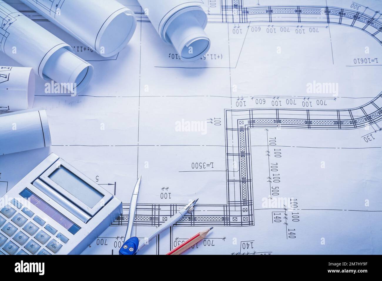 copyspace image composition rolled up white blueprints classical gray ...