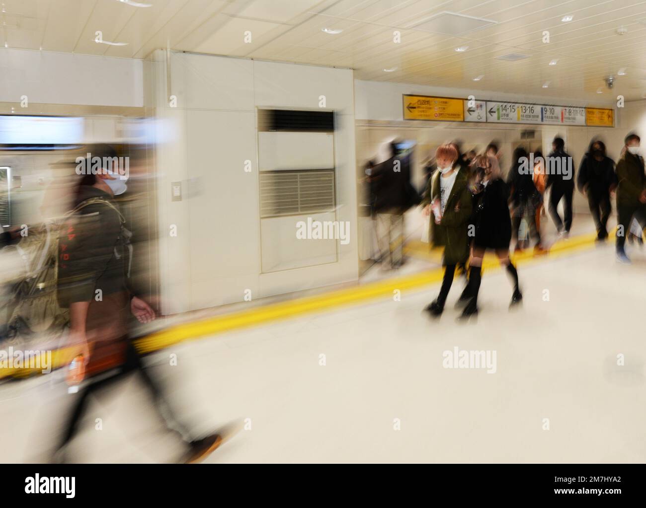 Japanese people rushing through Shinjuku station. Tokyo, Japan Stock ...