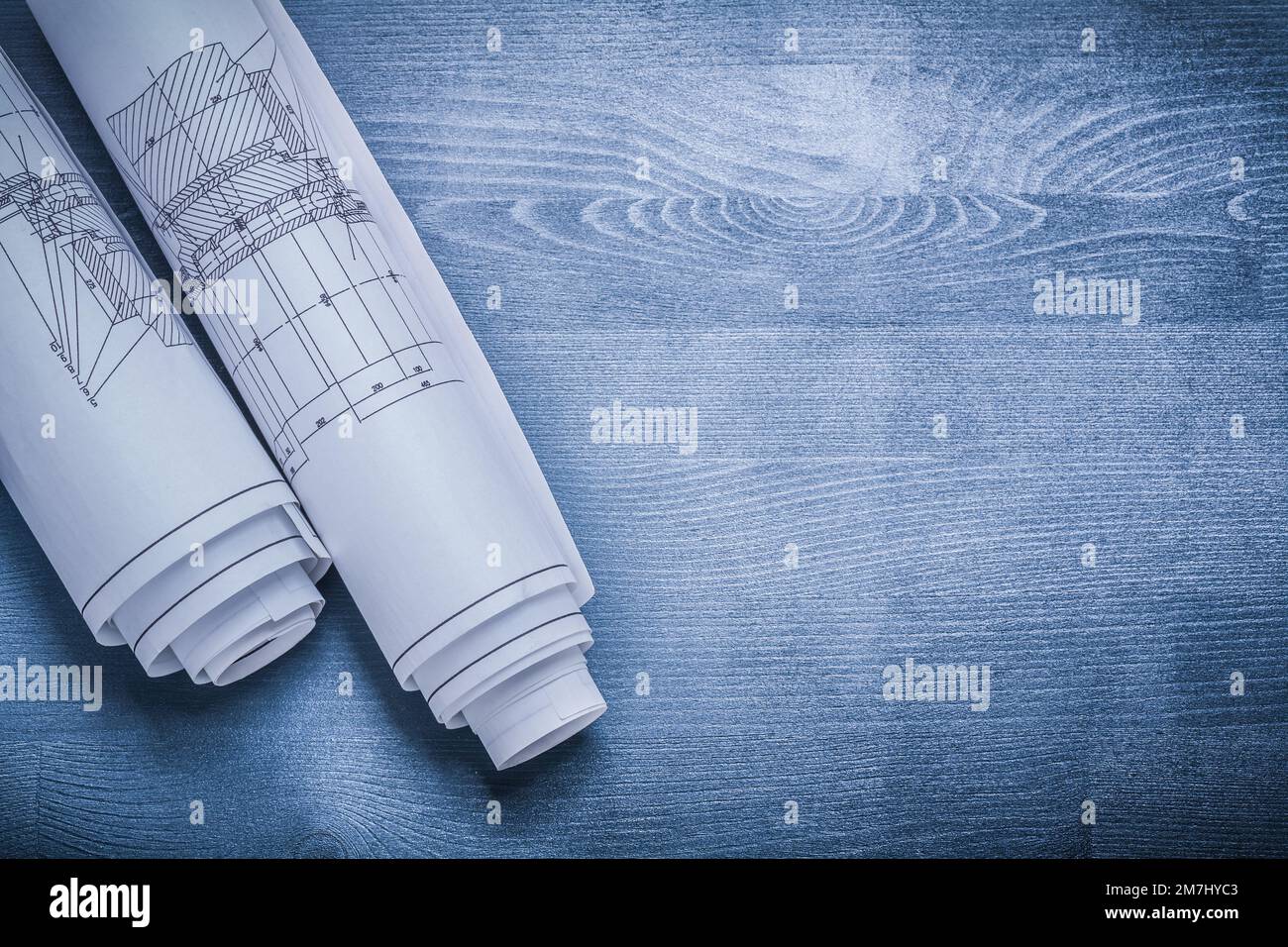 copyspace image white rolled blueprints Stock Photo - Alamy