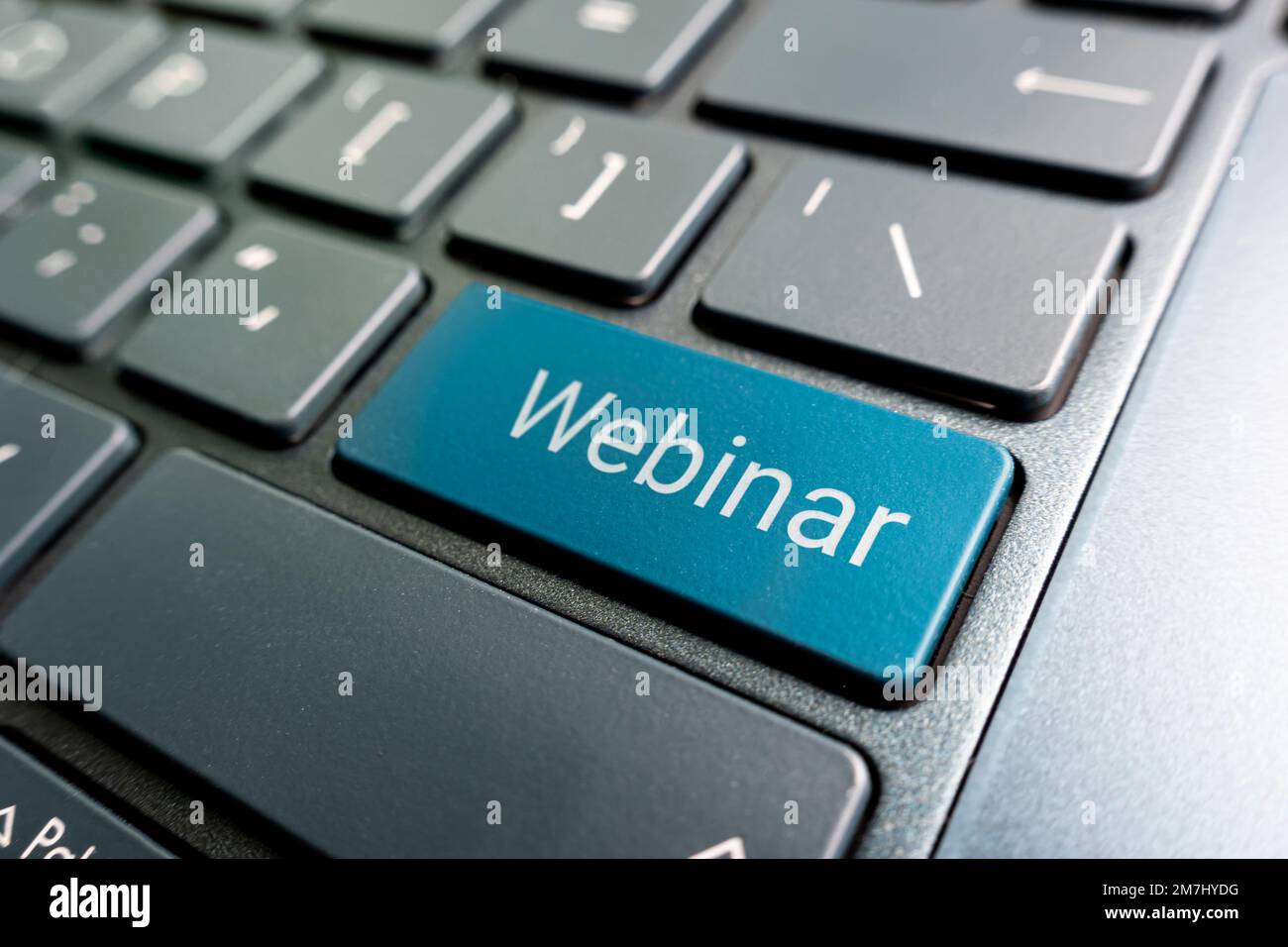 Keyboard with blue key Enter and word Webinar button modern pc text ...