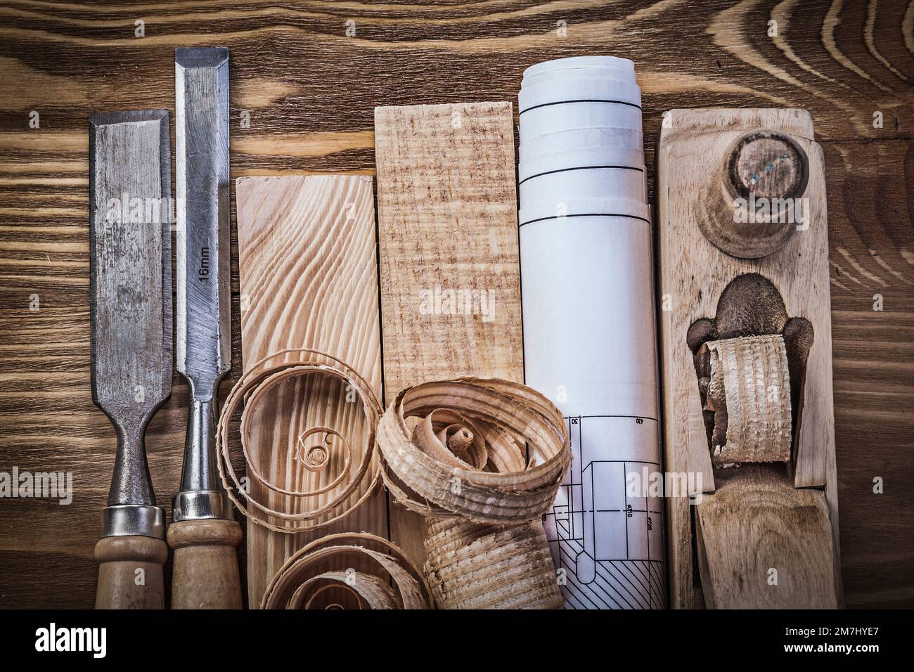 Engineering drawing shaving plane chisels wooden bricks shavings on ...