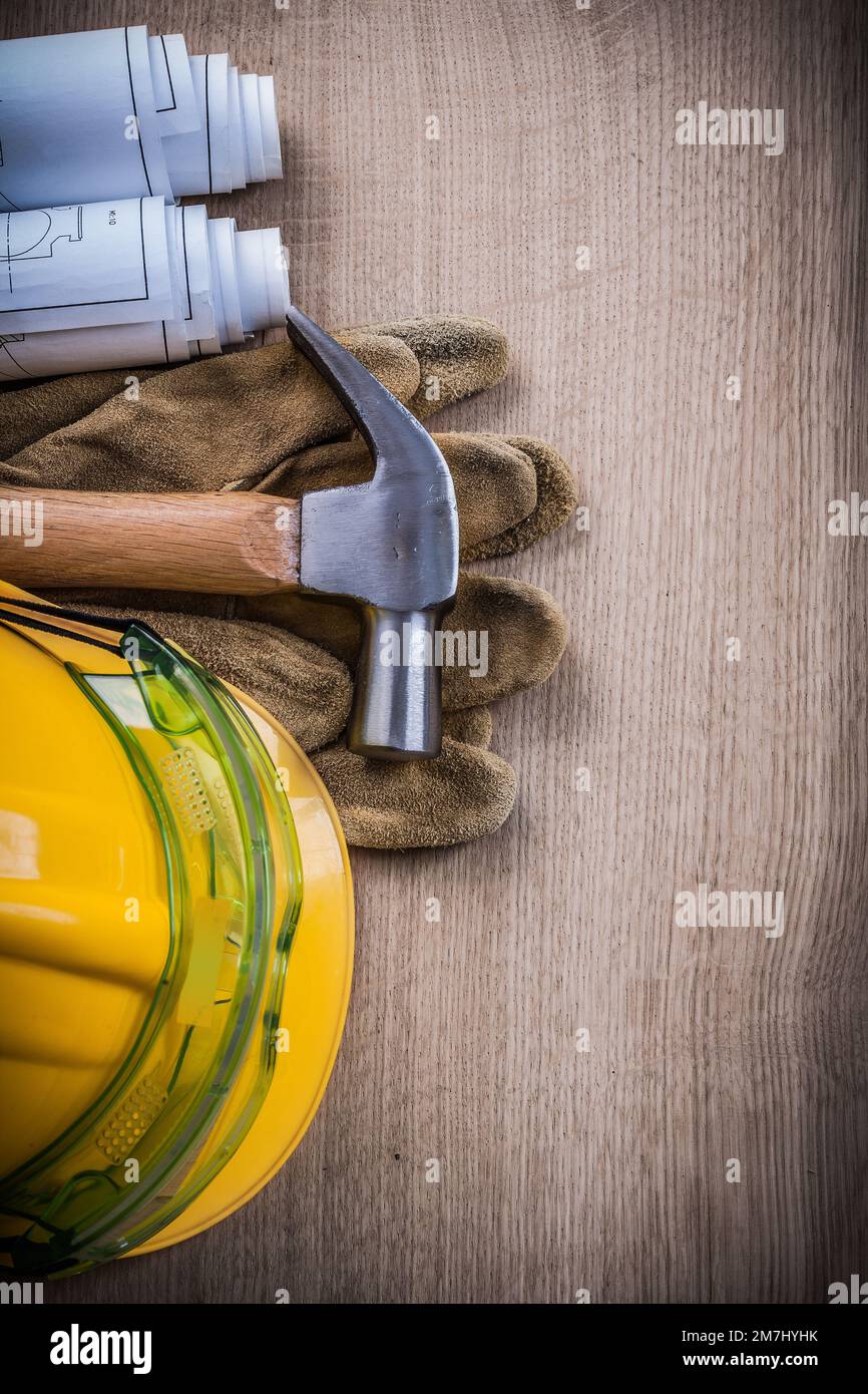 Hammer goggles blueprints building helmet safety gloves construction ...