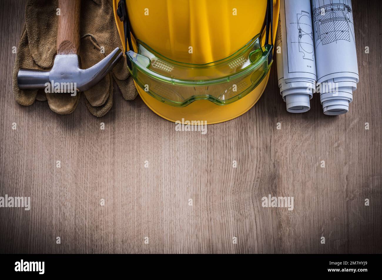 Hammer goggles blueprints protective gloves safety cap construction ...