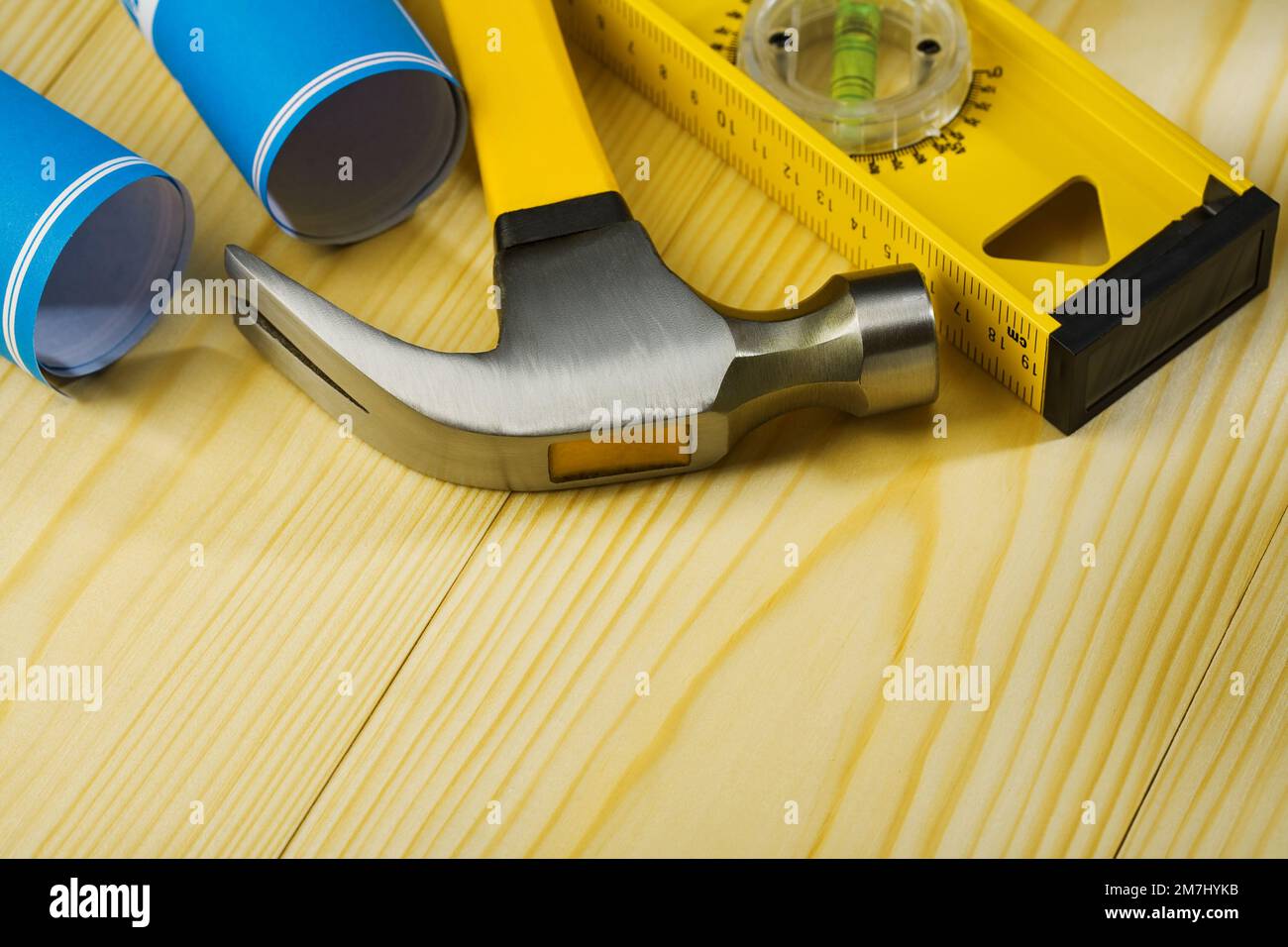 hammer level and blueprints Stock Photo - Alamy