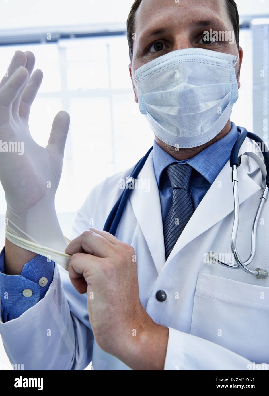Hell take care of your medical needs. a male doctor Stock Photo - Alamy