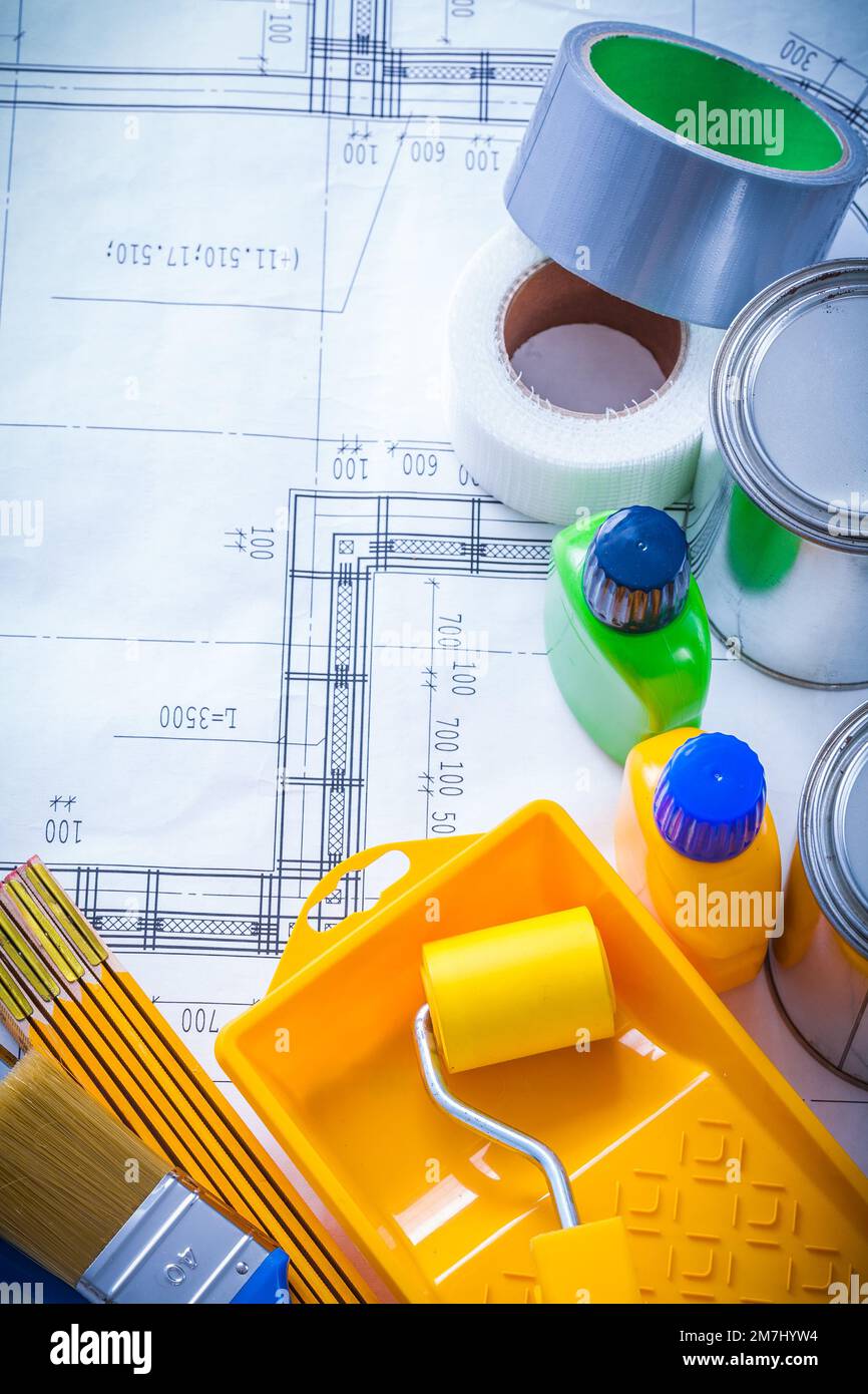 Household tape wooden meter and paint tools on construction plan ...