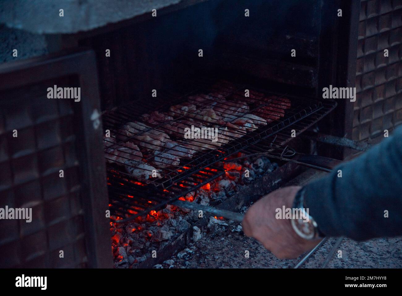 Black man cooking on a barbecue hi-res stock photography and images - Alamy