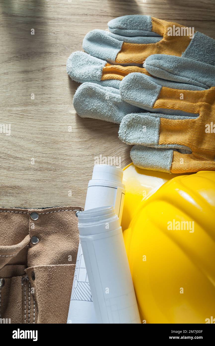 Leather tool belt blueprints protective gloves building helmet Stock ...