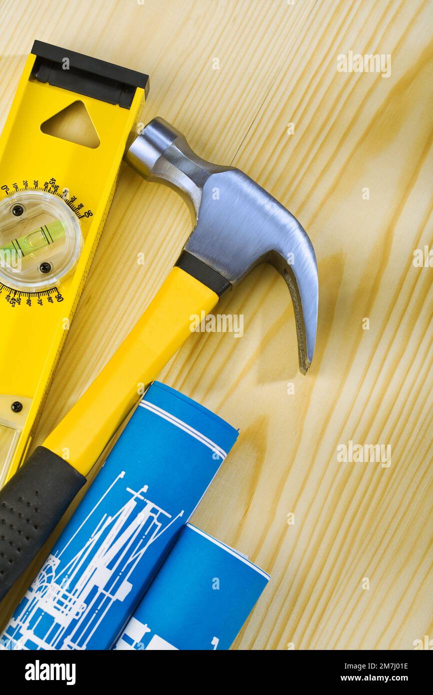 level hammer and blueprints Stock Photo - Alamy