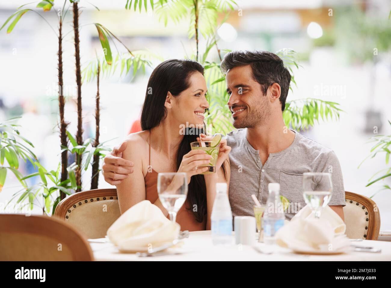 Celebrating their anniversary in style. A couple on a romantic date at ...