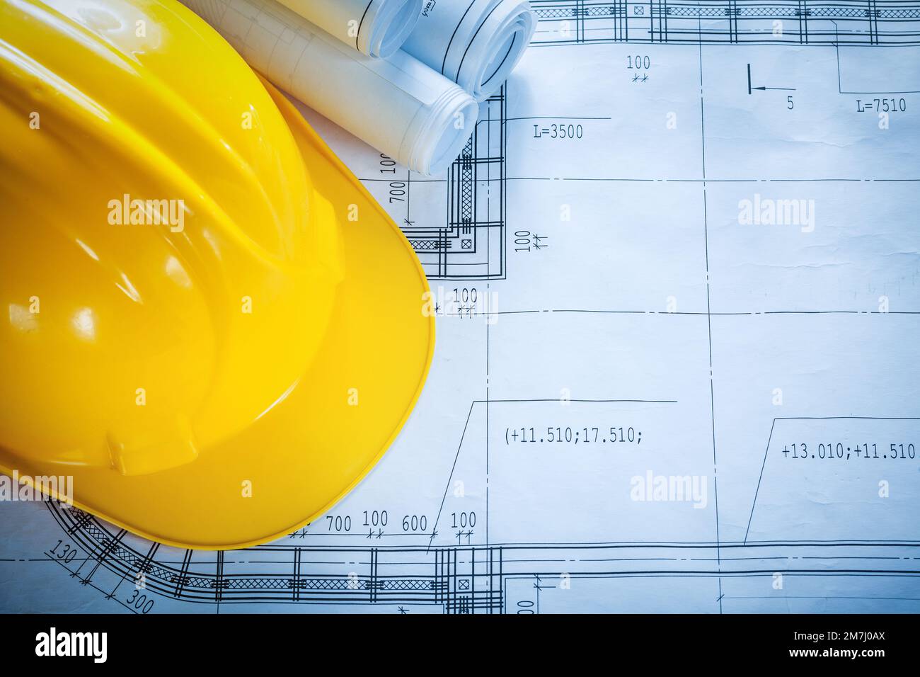 Protective building helmet construction drawings on blueprint Stock ...