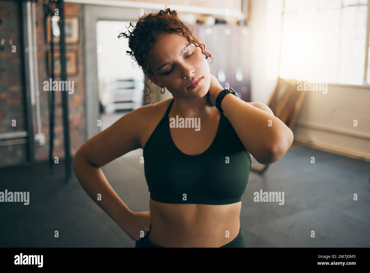 Fitness, shoulder pain and woman with an injury at gym after strength ...