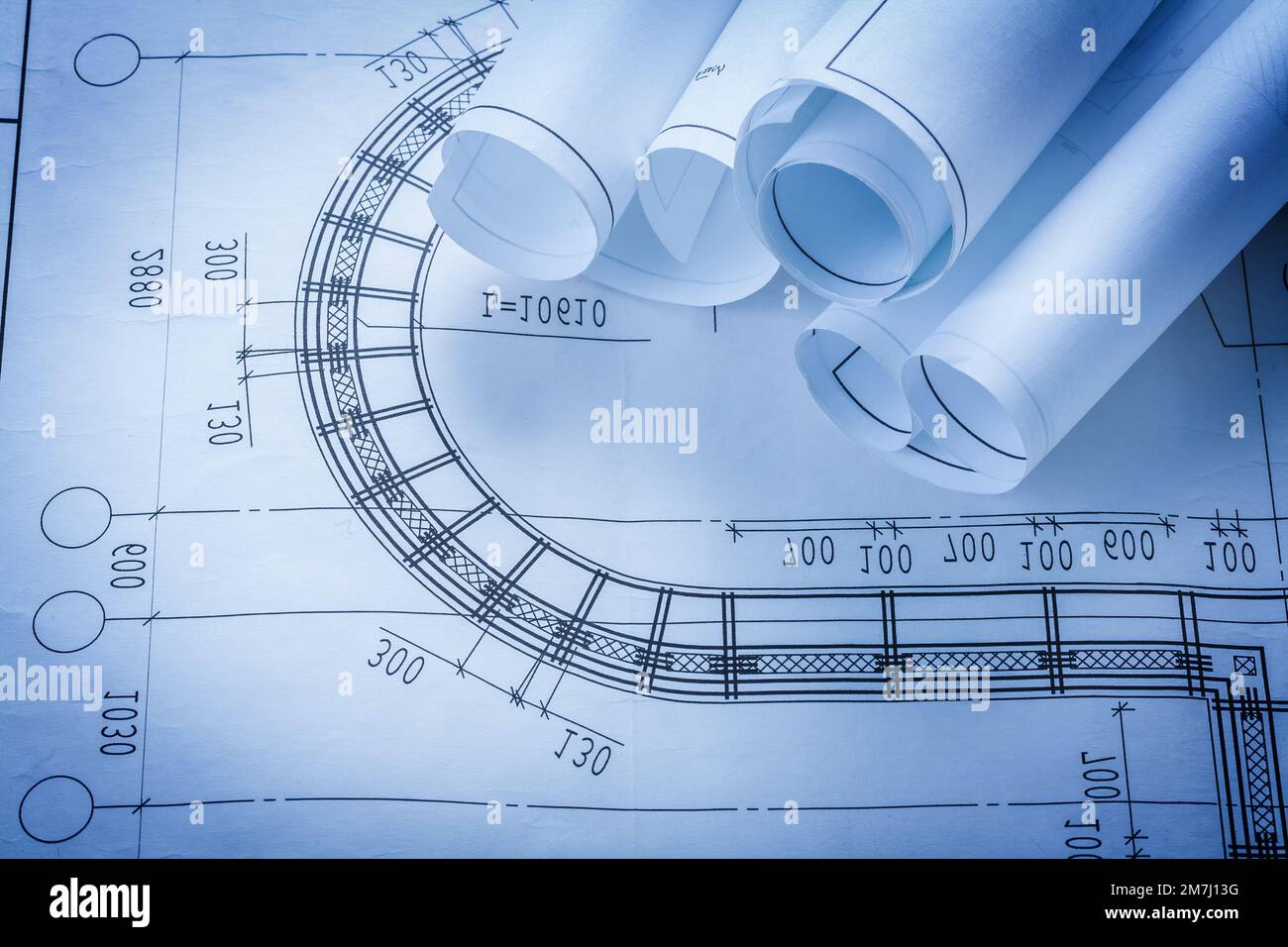 Rolls of construction plans building and architecture concept Stock ...