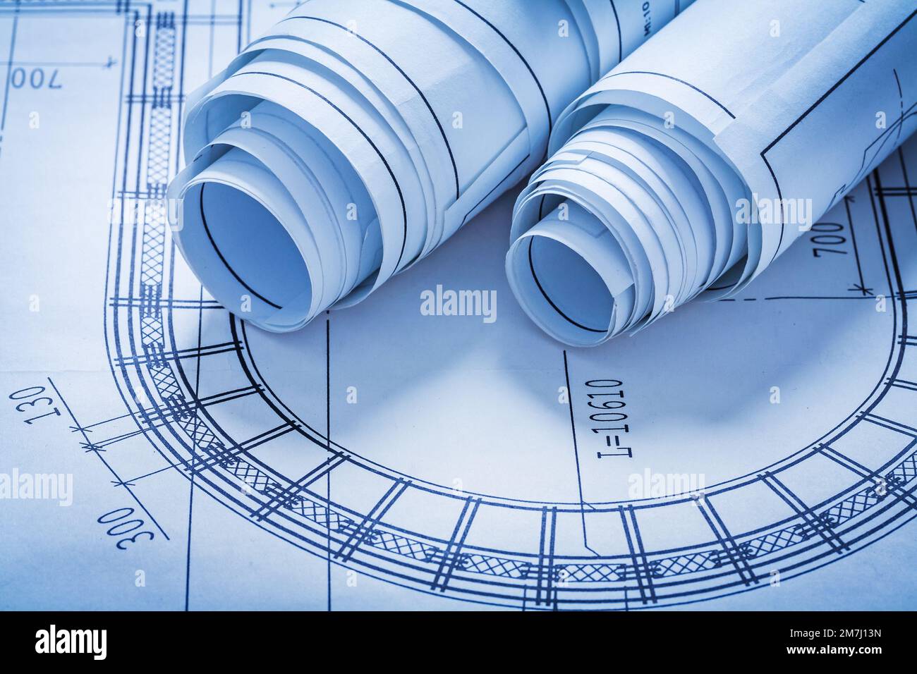 Rolls of construction sketches maintenance concept Stock Photo - Alamy