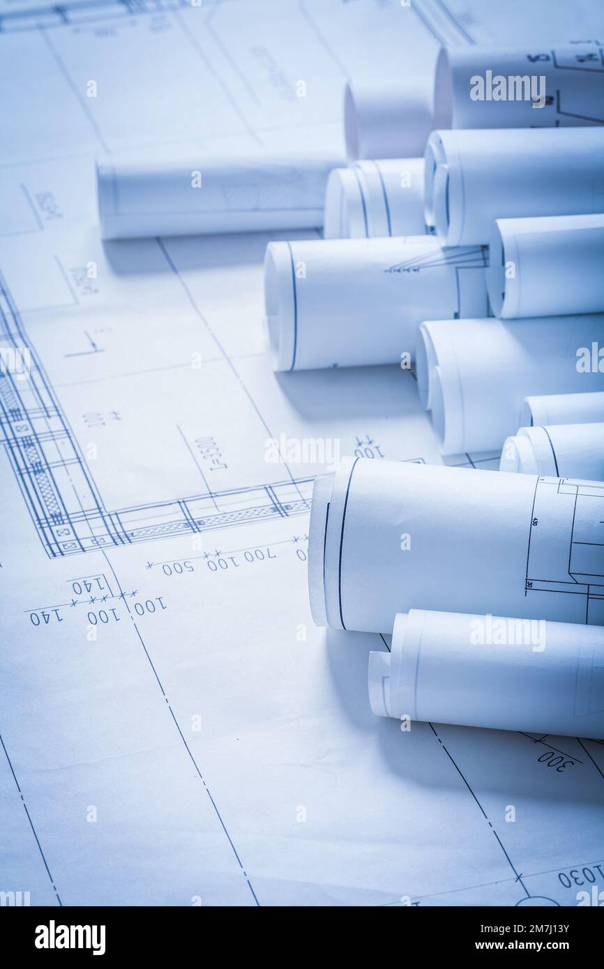Rolls of engineering construction plans building concept Stock Photo ...