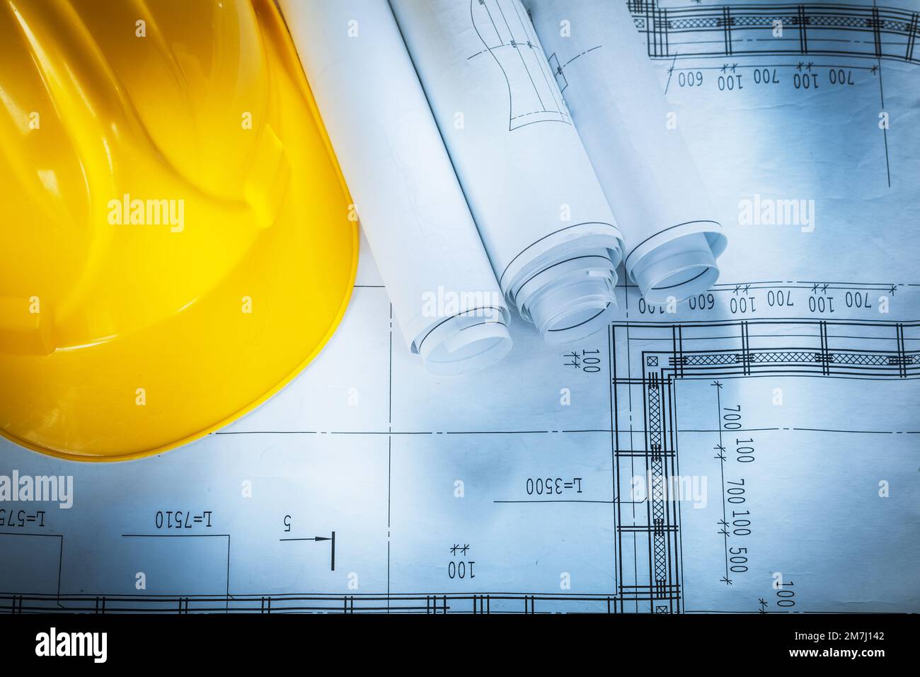 Safety cap construction plans on blueprint Stock Photo - Alamy