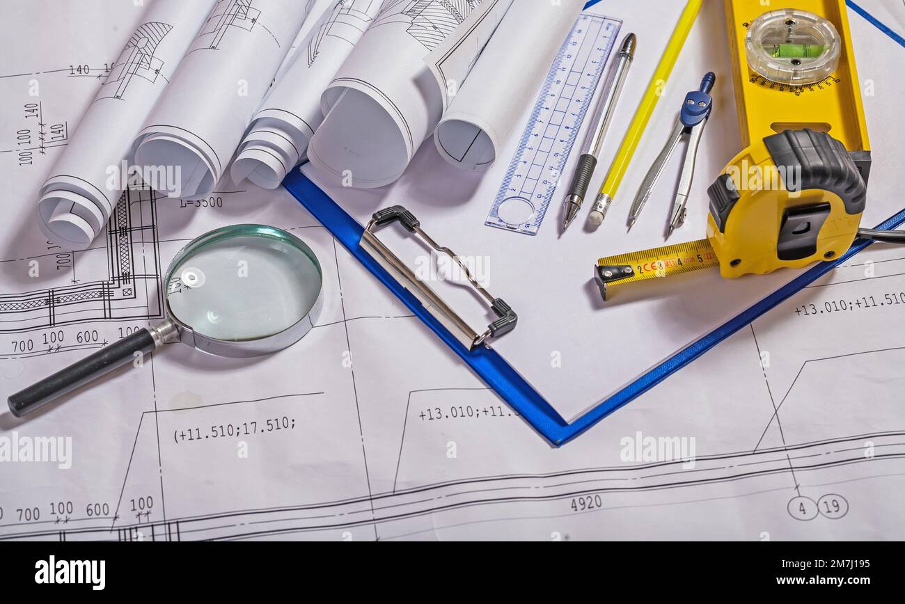 set of architect tools on blueprint Stock Photo - Alamy