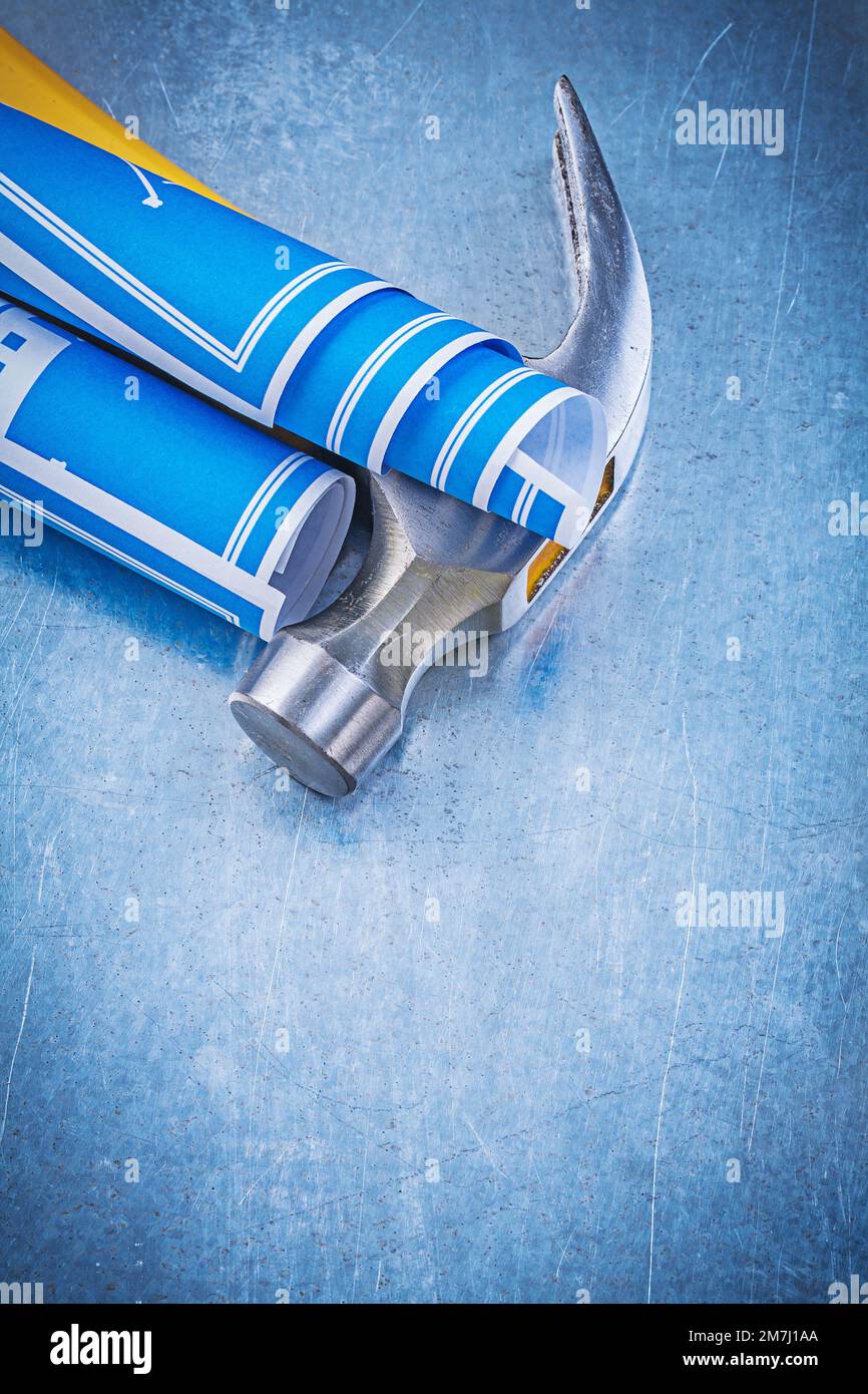 Set of blue construction plans claw hammer on metallic background Stock ...