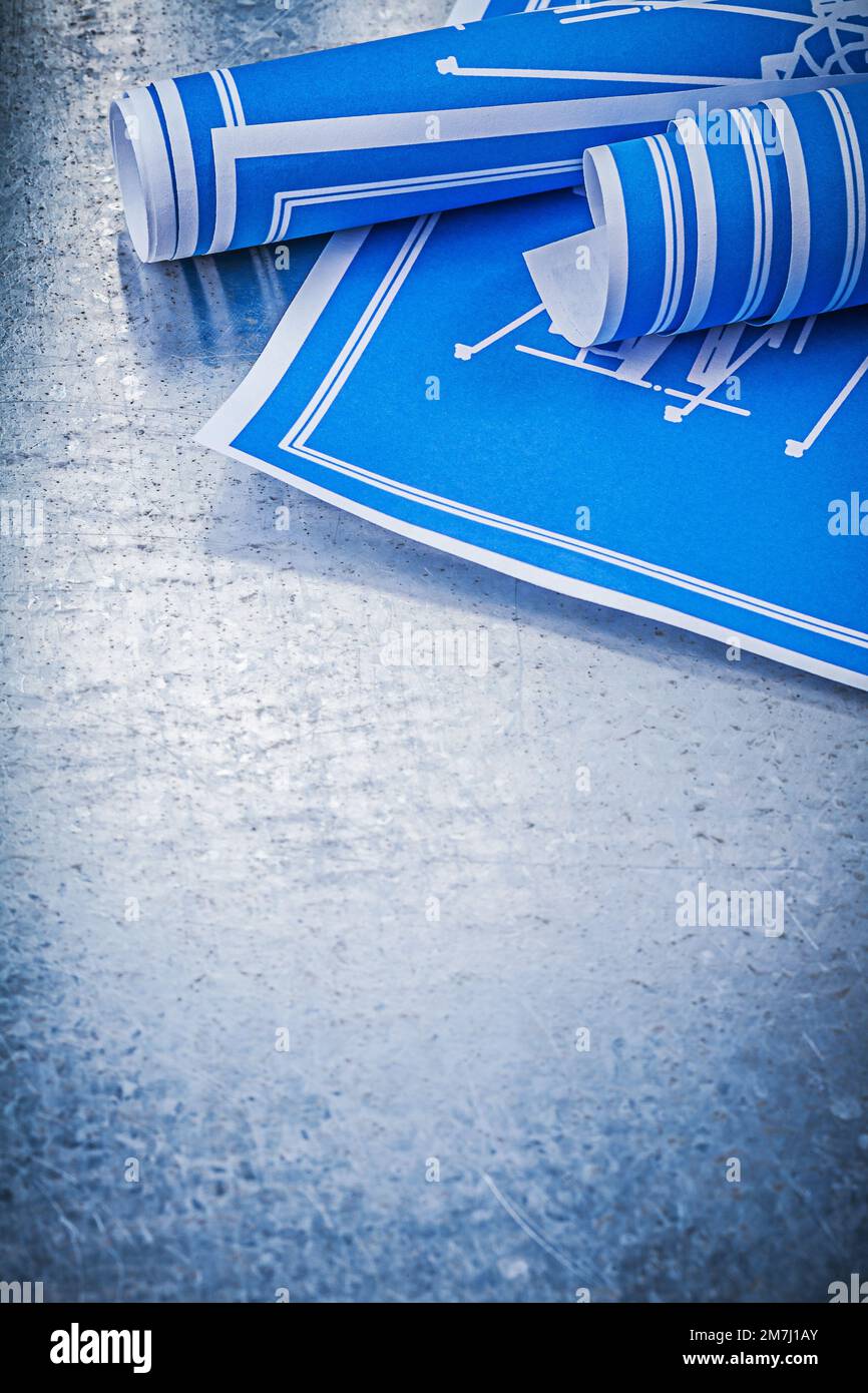 Set of blue engineering drawings on metallic background construction ...