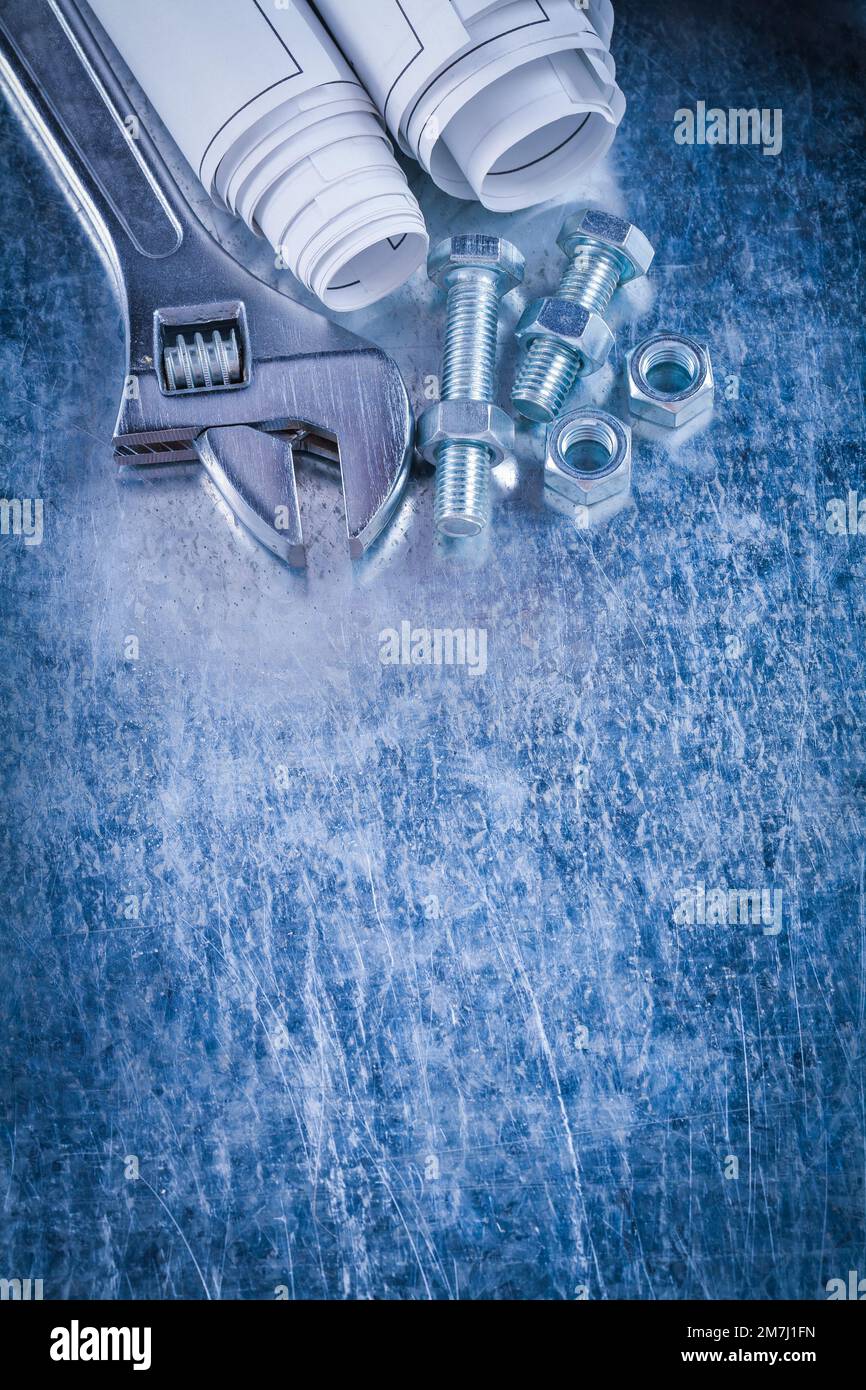 Stainless adjustable spanner construction nuts bolts and blueprints on ...