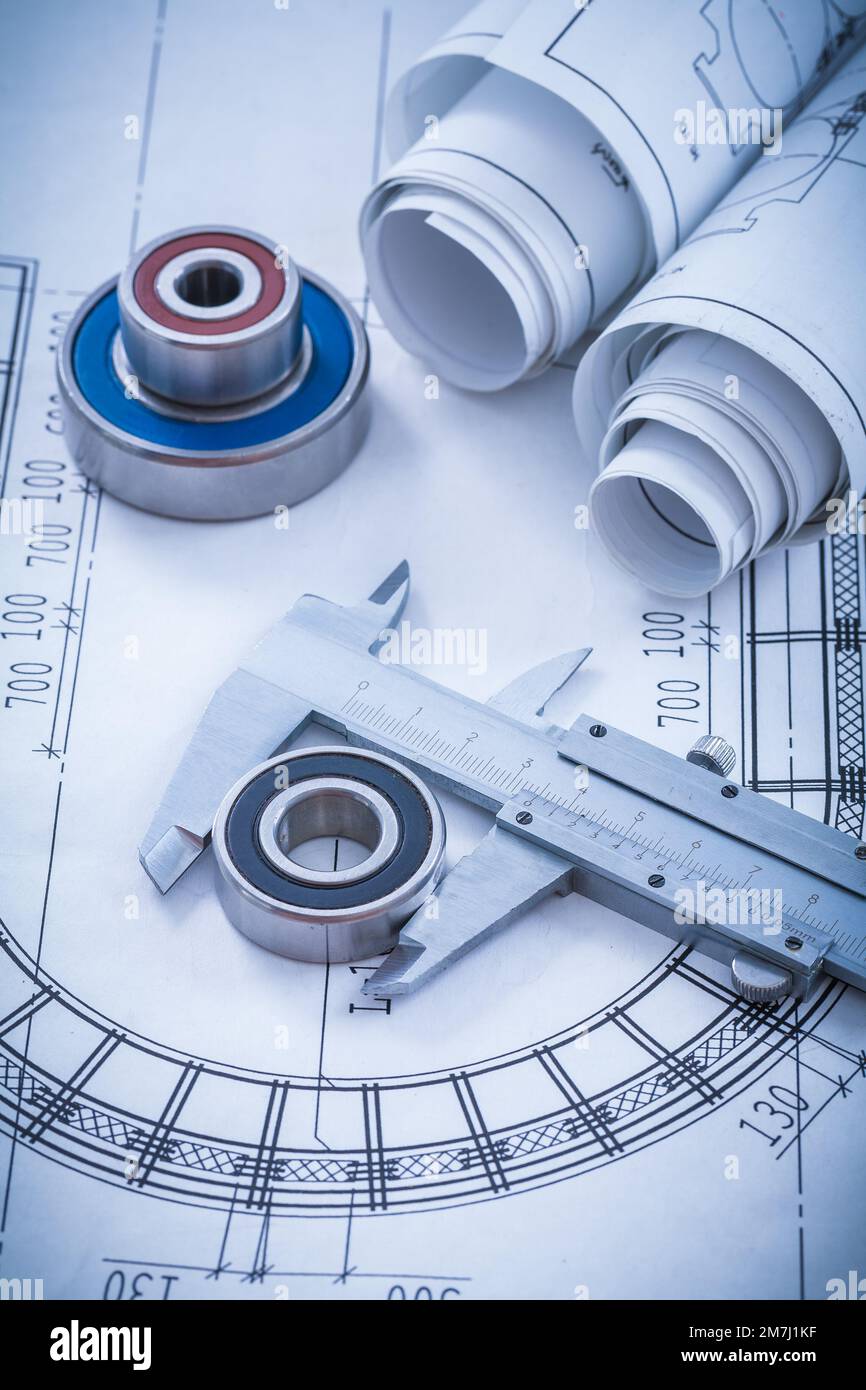 Vertical image of construction plans metal slide caliper rolling ...