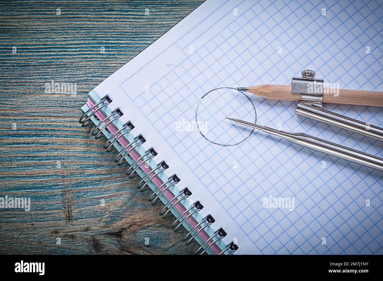 Vintage drawing compass pencil checked copybook on wood board ...