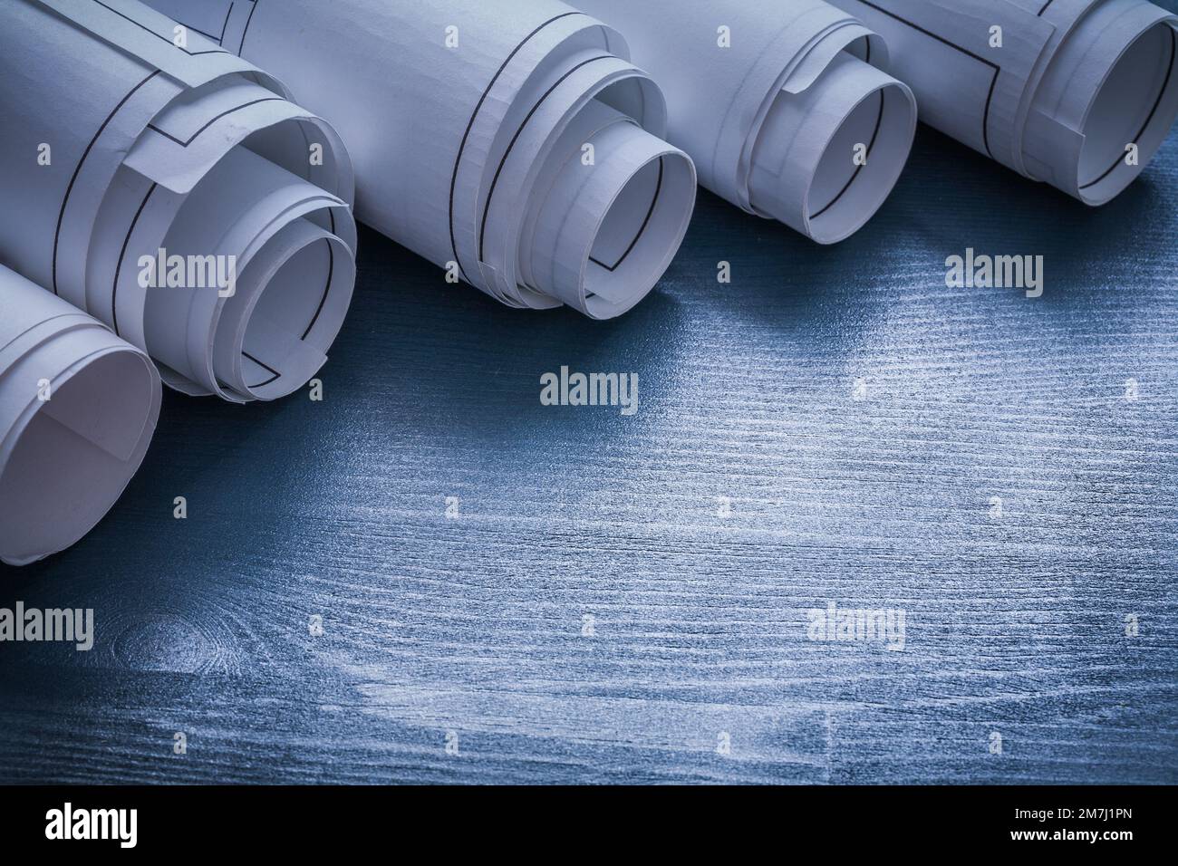 very close up view five rolls of blueprints very close up Stock Photo ...