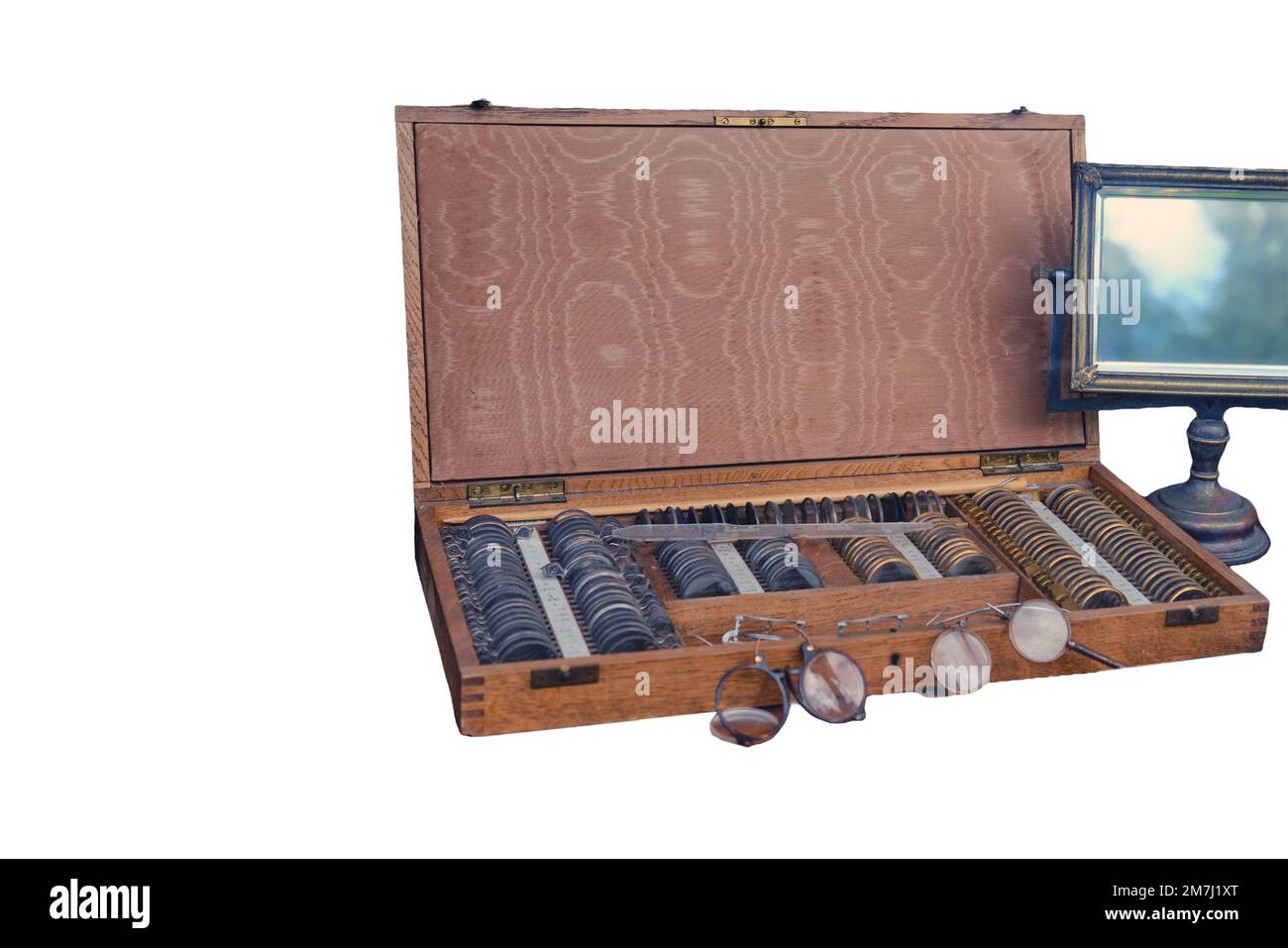 Vintage ophthalmologist medical instruments with mirror and glasses ...