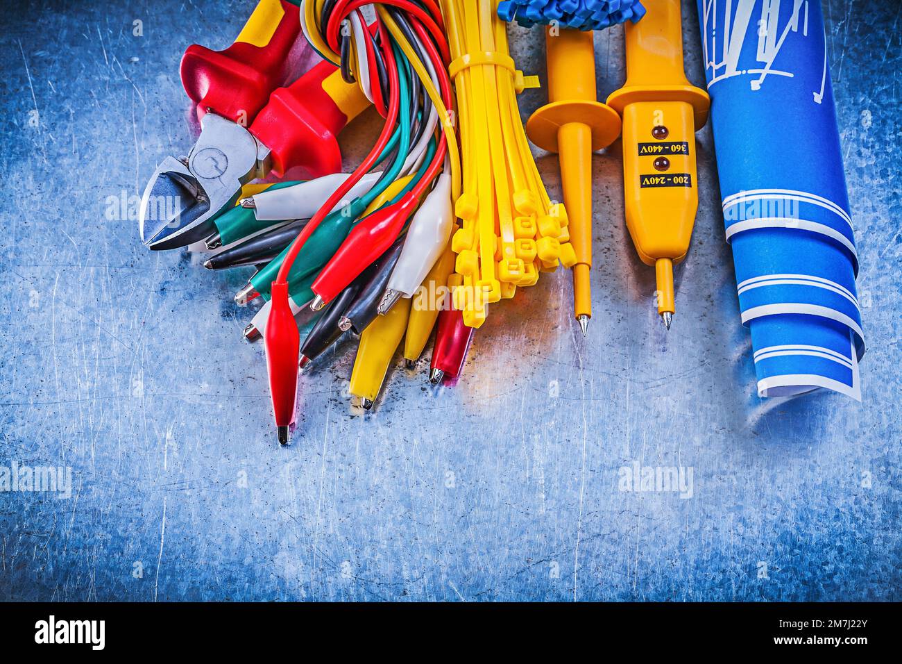 Yellow electrical tester crocodile plugs cable ties blue construction ...