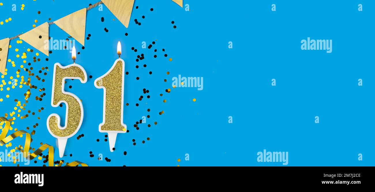 Golden candle number fifty one. Birthday or anniversary card with the ...