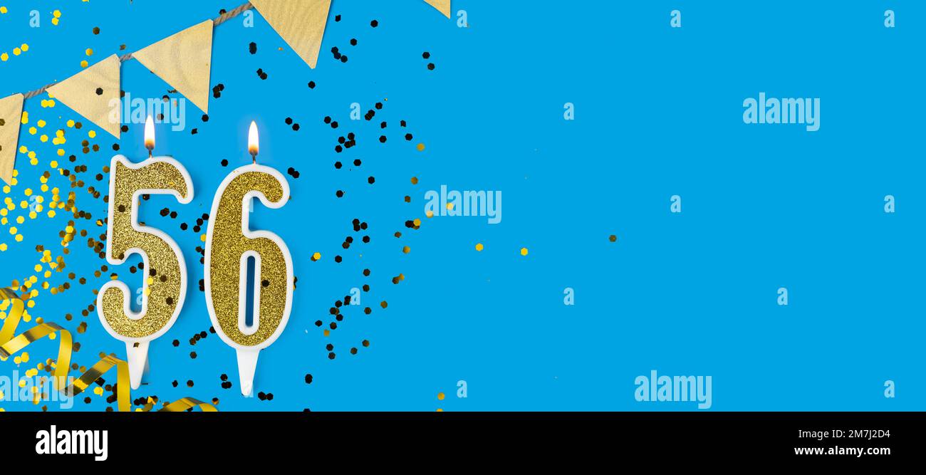 Golden candle number fifty six. Birthday or anniversary card with the ...