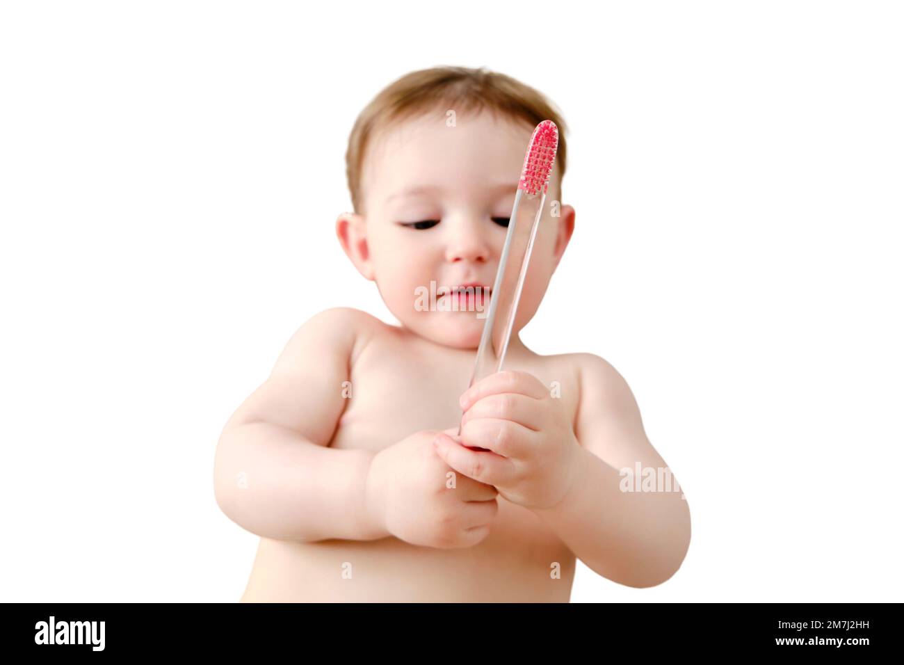 Child cleans his mouth with a toothbrush in his hands, isolated on a ...