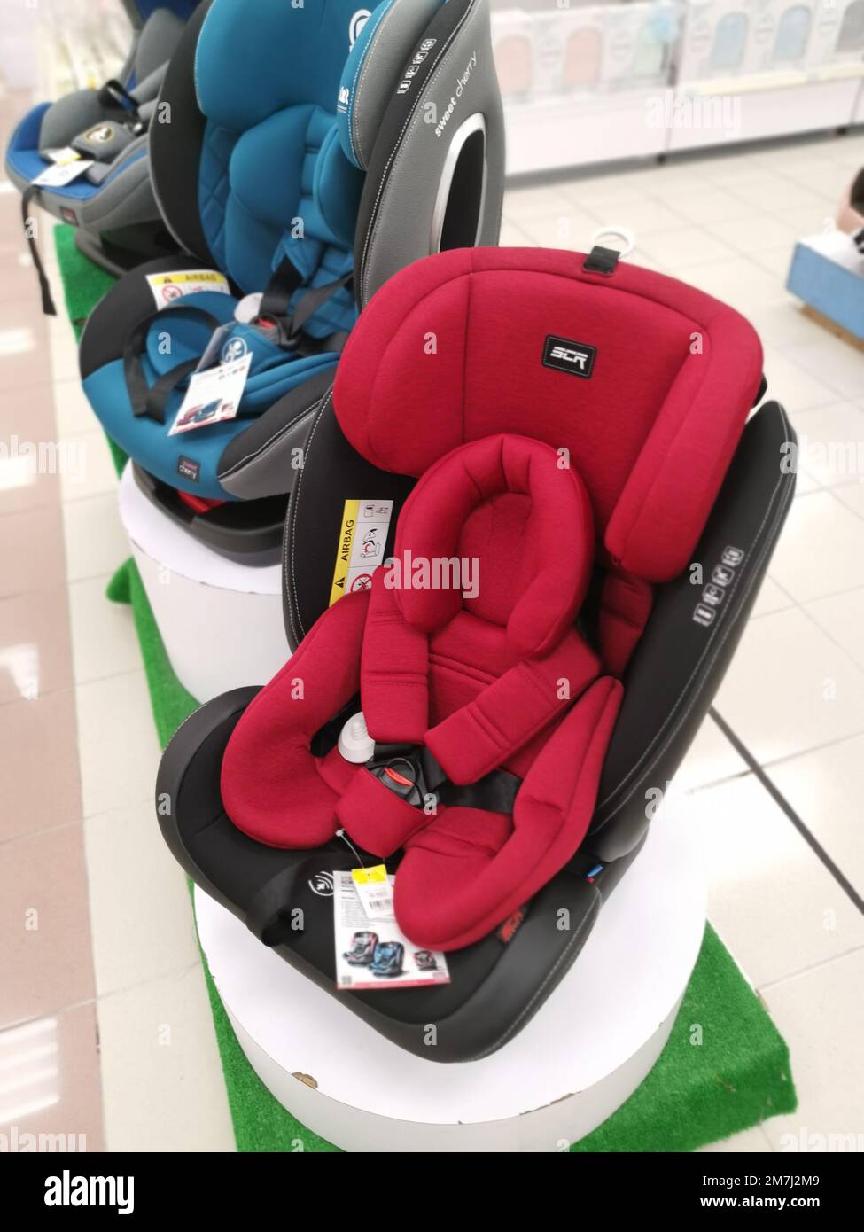 Perak,Malaysia. October 20,2022: Variety of colorful baby carrier cot ...