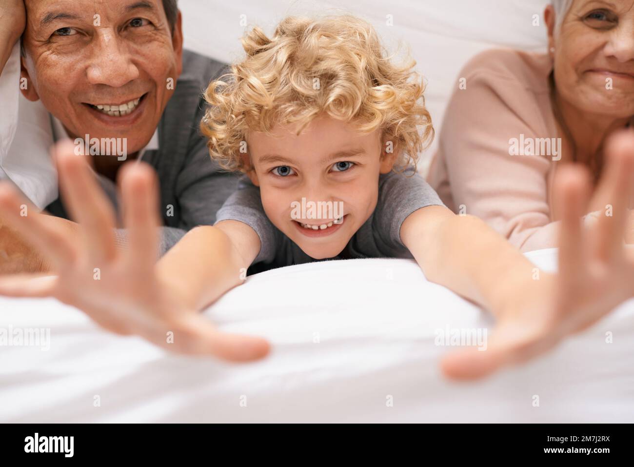 Its always fun at granny and gramps. A young boy having fun with his ...