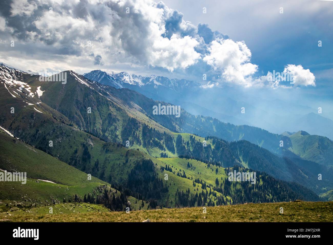 Amazing view landscape of summer in Almaty cloudy mountains in the Ile ...