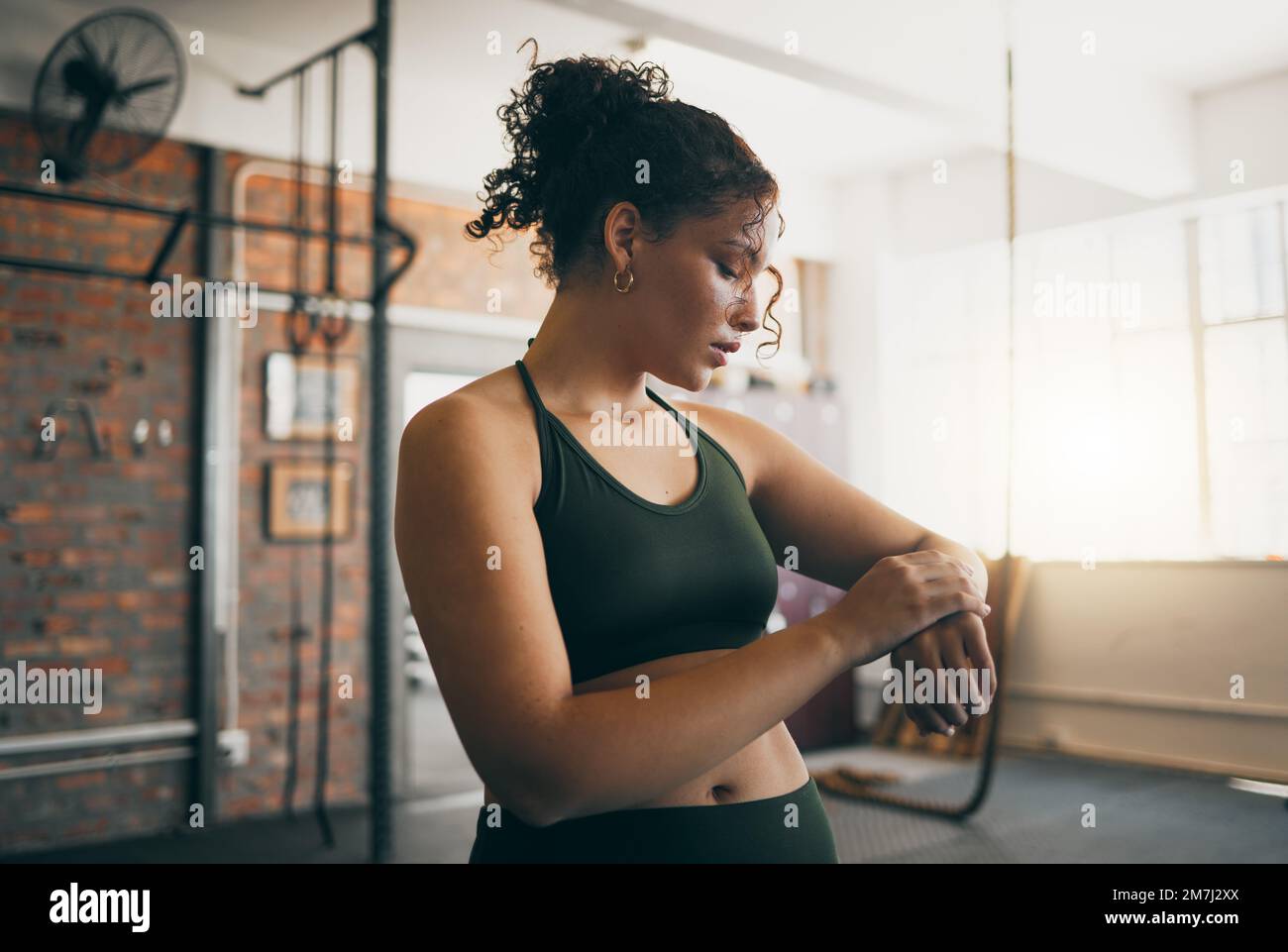 Fitness, smartwatch and gym workout progess of a woman doing exercise ...