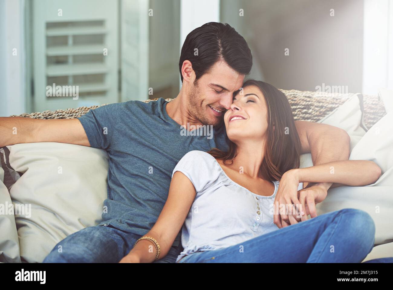 Content in each others arms. an affectionate young couple enjoying ...