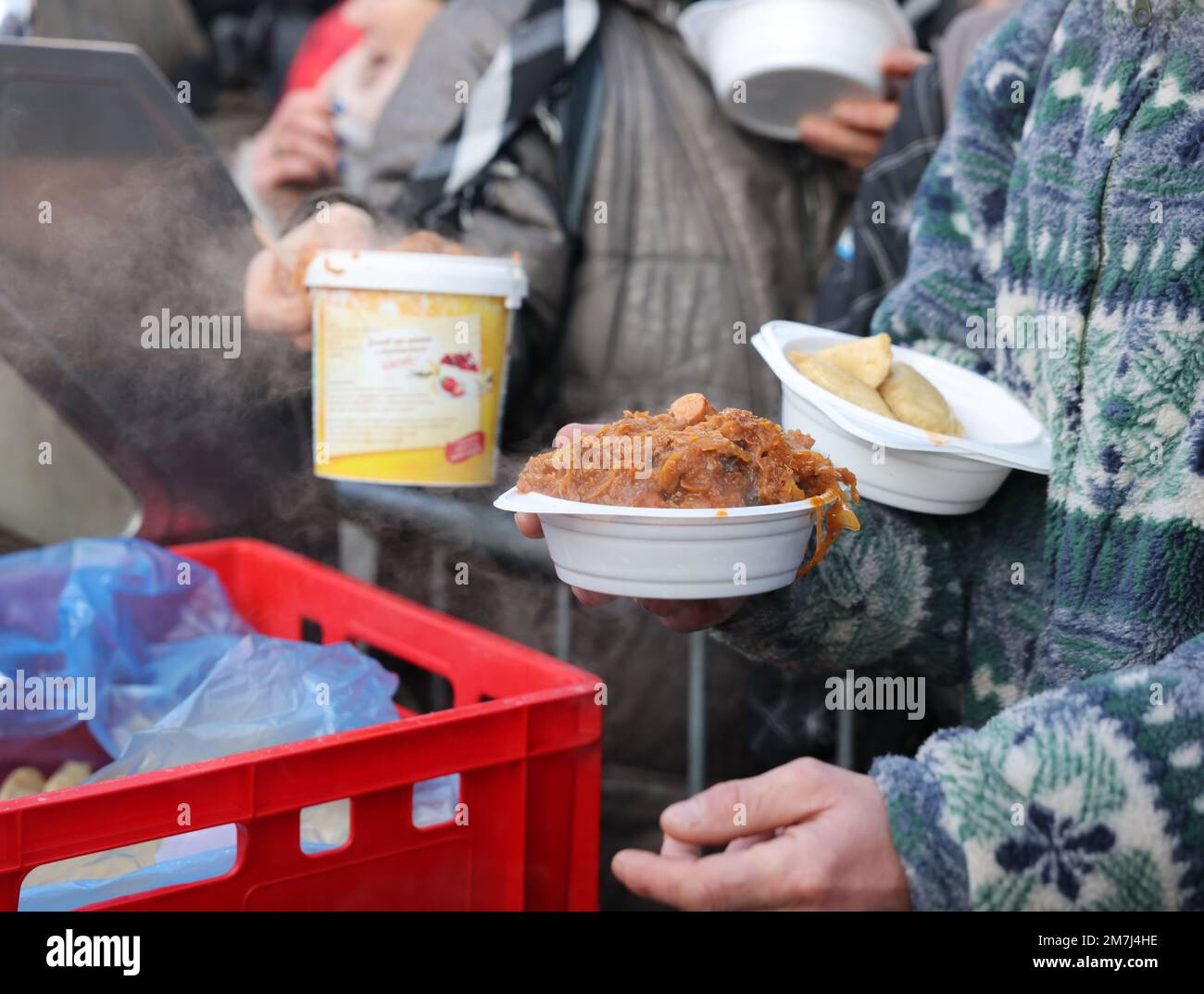 Warm food for the poor and homeless Stock Photo - Alamy